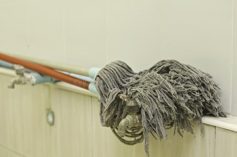 Mops and broom stock photo. Image of broom, supplies, hanging - 314172