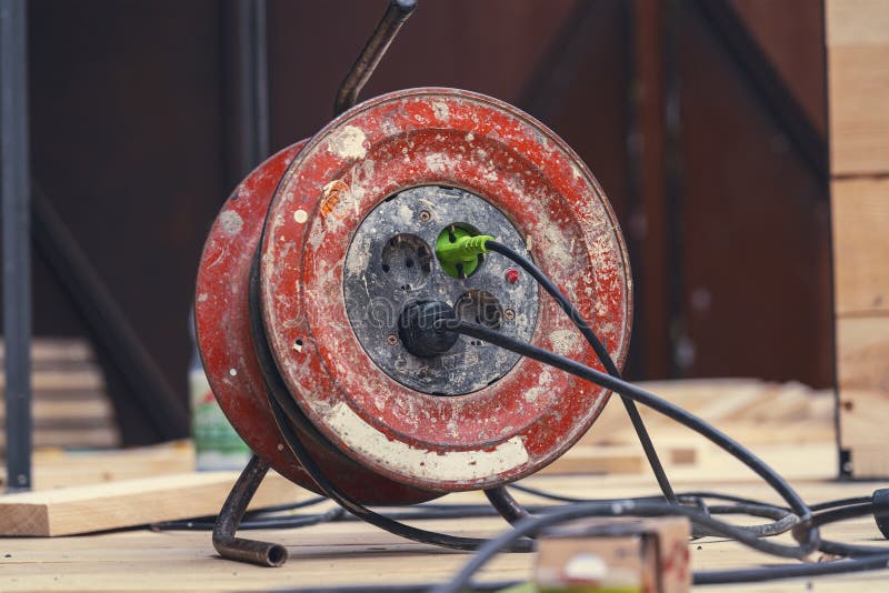 Old, dirty, red cable reel stock image. Image of metal - 207856137