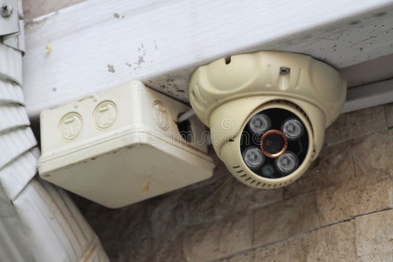 Security Camera on the Wall. Dirty Outdoor Security Camera and Video ...