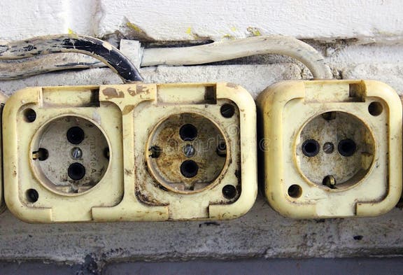 Old Dirty Sockets on a Brick Wall Stock Photo - Image of device ...