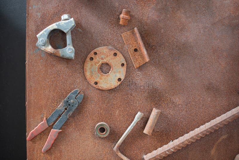 Old, Dirty Tools Against Rusty Metallic Surface Background Seri Stock ...