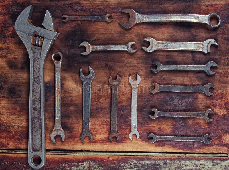 Old dirty tools on table stock image. Image of rusty - 69211821