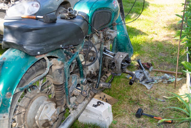 An Old Disassembled Motorcycle is Standing on the Street. Editorial ...