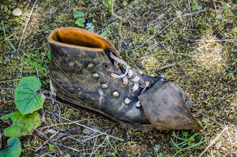 Discarded Shoes. Boots. Rubbish on the Street Stock Image - Image of ...