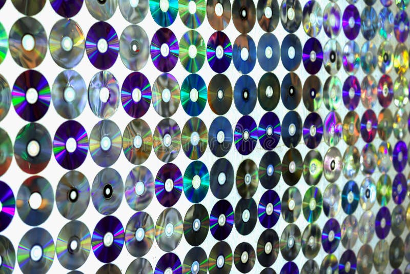 Old Discs Cd on Wall with with Multicolored Colorful Reflections ...