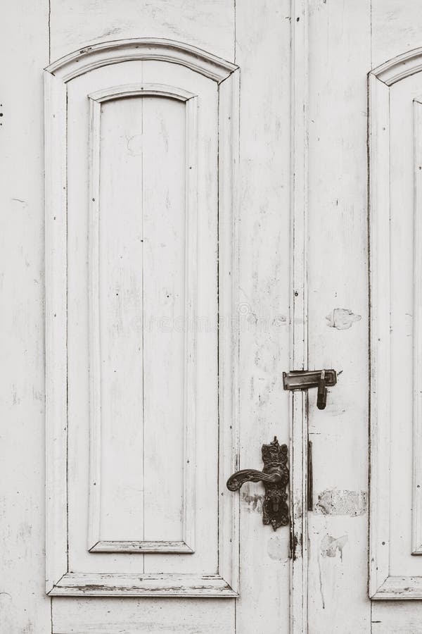 Old distressed white doors stock image. Image of house - 75573785