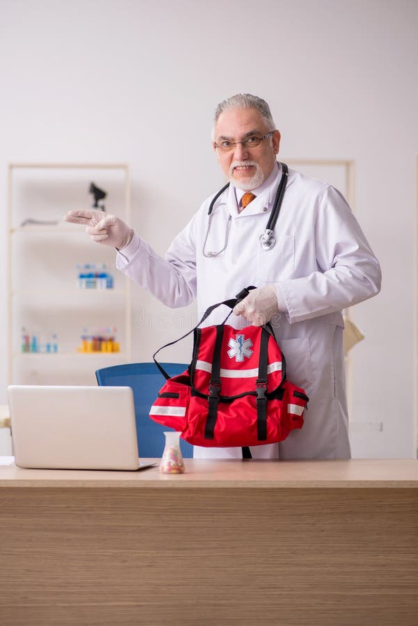 Old Male Doctor in First Aid Concept Stock Image - Image of ...