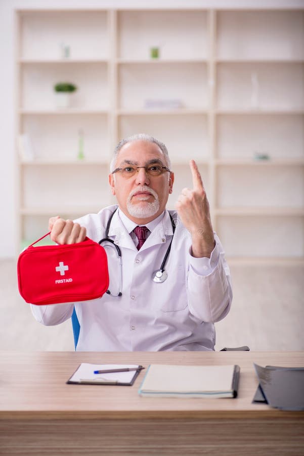 Old Male Doctor Holding First Aid Bag Stock Photo - Image of pharmacy ...