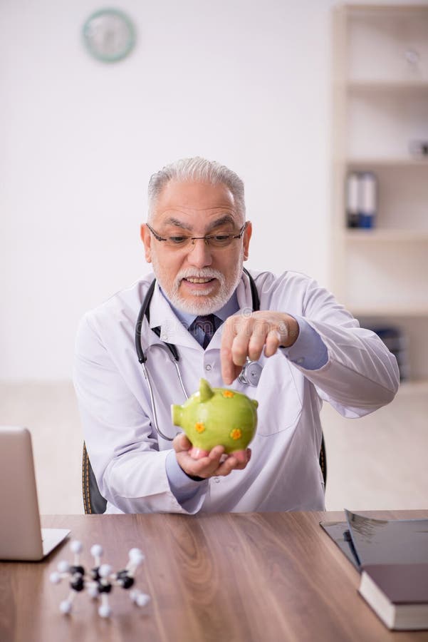 Old Male Doctor in Planning Retirement Concept Stock Image - Image of ...