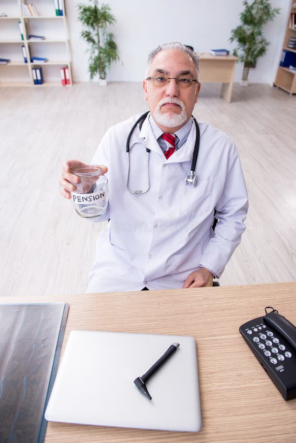 Old Male Doctor in Retirement Concept Stock Image - Image of money ...