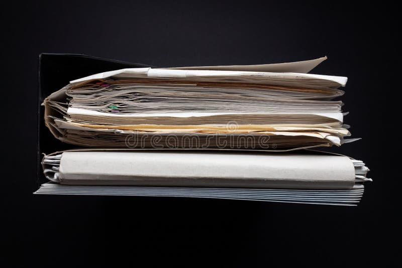 Old Documents on a Black Table in the Archive. Edges of Sheets and ...