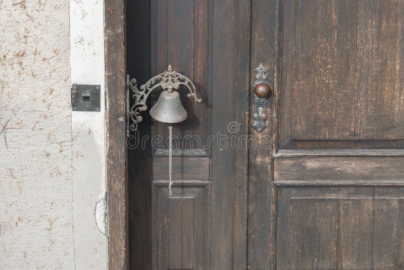 Old Door Bell on an Old Wooden Door Stock Image - Image of metal ...