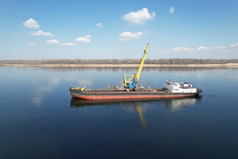An Old Dry-cargo Ship is Anchored Under Sand Loading on the Volga Stock ...
