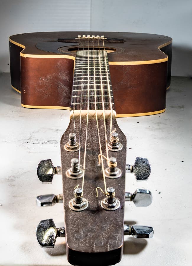Old dusty acoustic guitar stock photo. Image of guitar - 234817188