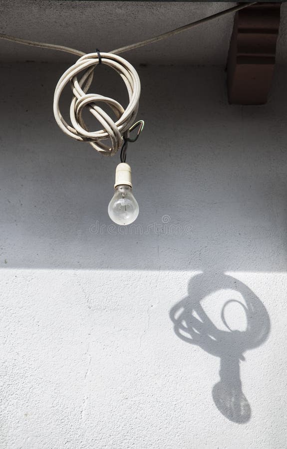Old Dusty Light Bulb and Shadow Stock Image - Image of light, excess ...