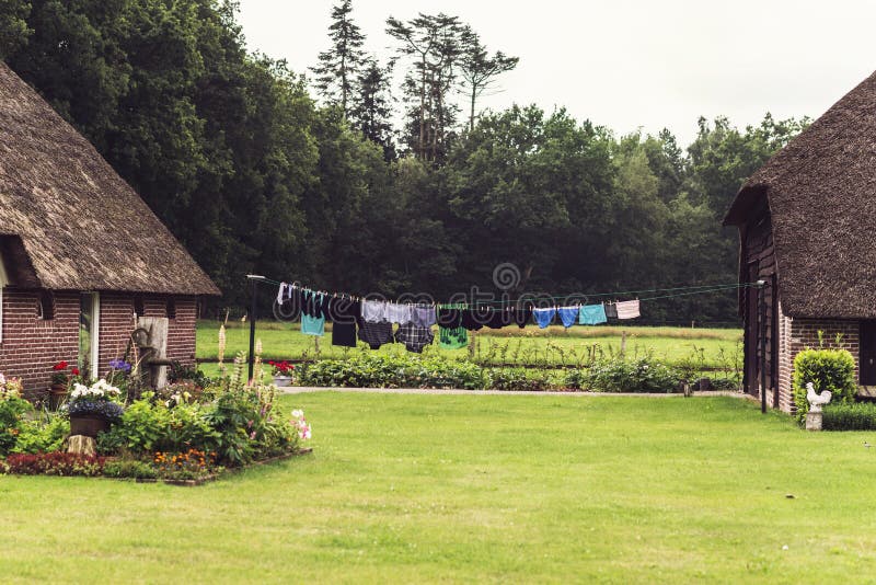 Old Dutch Farm in Summer with Laundry Drying Outdoors. Stock Image ...