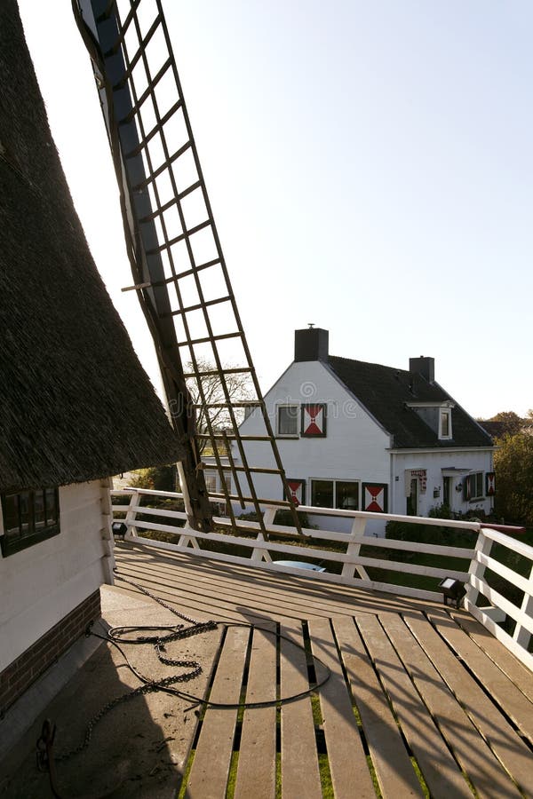 Old Dutch Windmill with Miller House Stock Photo - Image of view ...