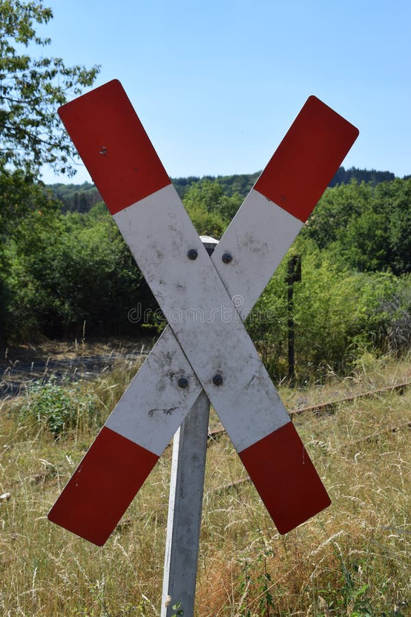 Railroad Crossing Marked by a St. Andrews Cross Stock Image - Image of ...