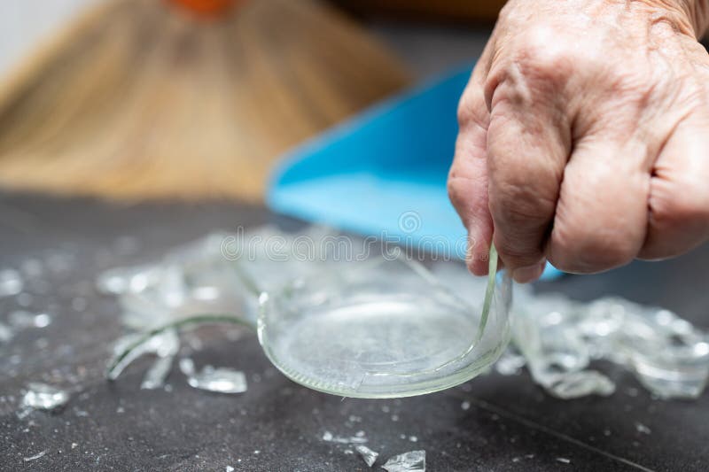 Old Elderly Holding a Piece of Broken Glass, Pick Up Broken Glass with ...