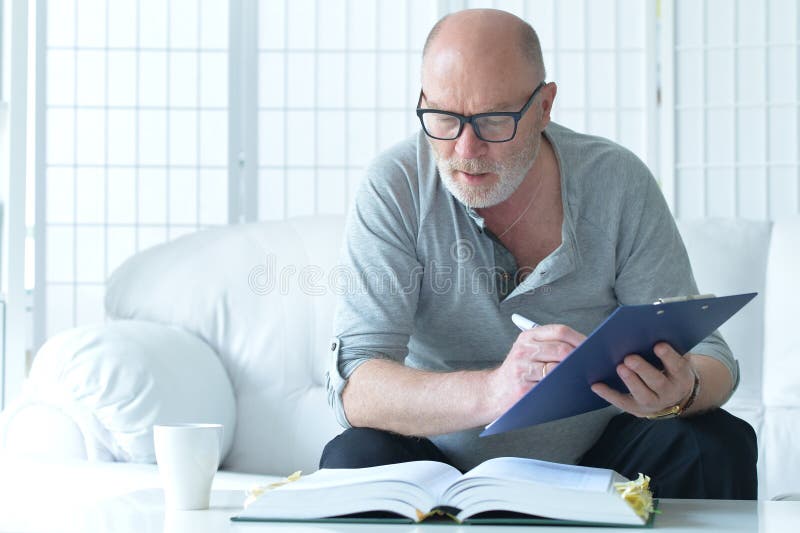Senior Old Man with Book Working at Home Stock Image - Image of indoors ...