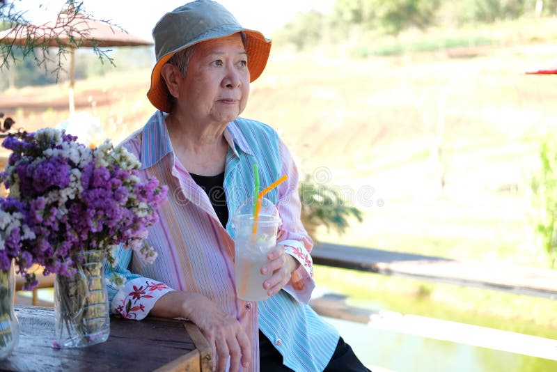 Old Elderly Senior Elder Woman Drinking Iced Lemonade Stock Photo ...