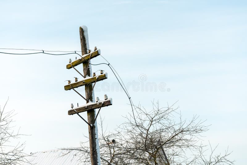 Old Electric Pole with Wires Outside in Winter. Stock Image - Image of ...