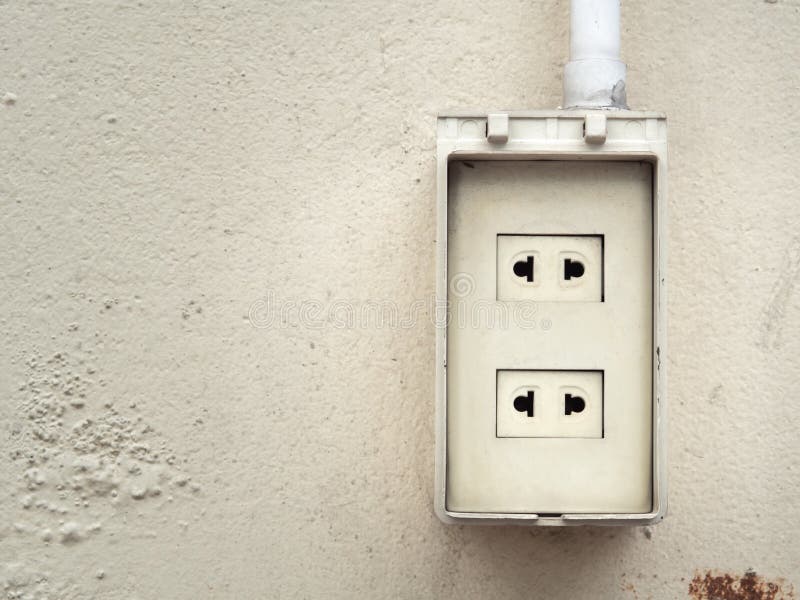 Old Electrical Plug Installed on the Cement Wall Stock Image - Image of ...
