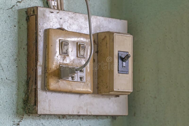 The Old Electrical Plug Next To the Cream Wall Stock Photo - Image of ...