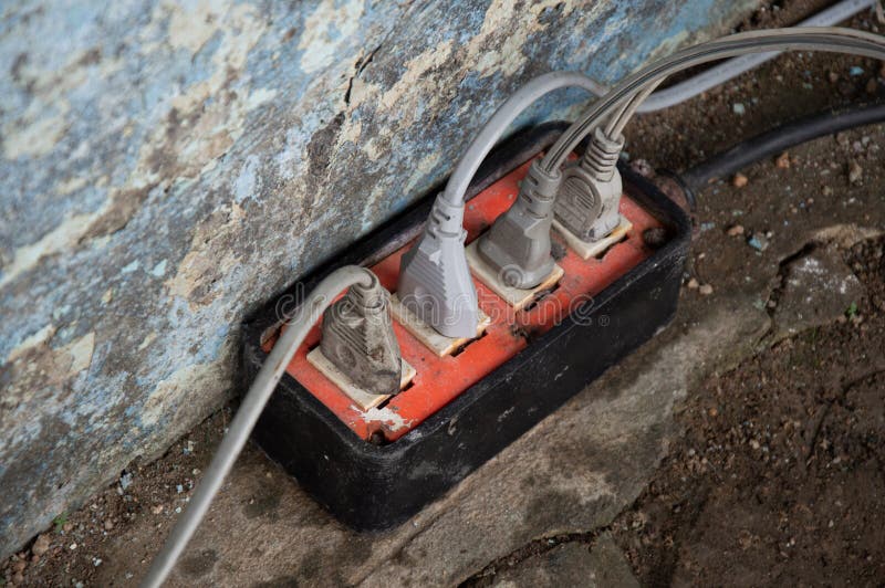 Old Electrical Plugs and Sockets Placed on a Damp Surface, it May Not ...