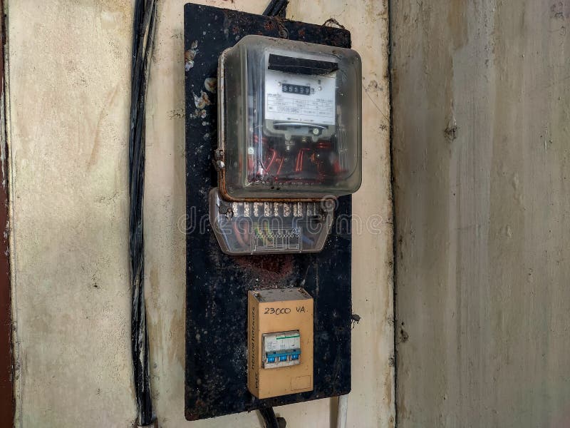An Old Electricity Meter Mounted on a Worn Wall Stock Image - Image of ...