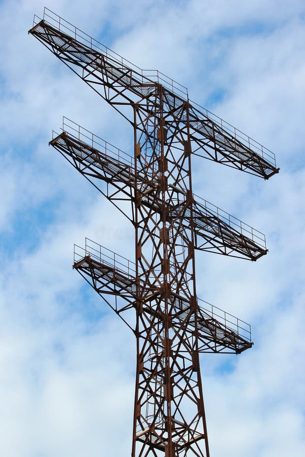 Old Electricity Pylon Against Cloudy Sky Background Stock Image - Image ...