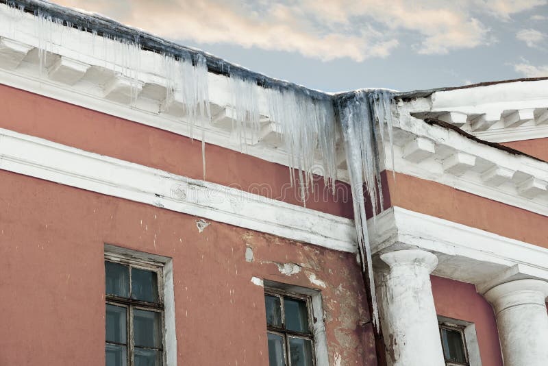 Old Emergency Building with Large Icicles on the Roof Stock Image ...