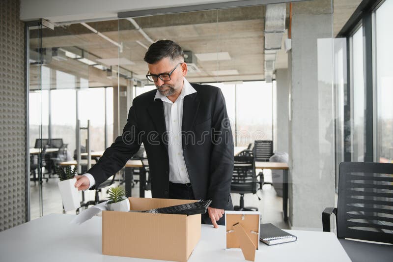 Old Employee Leaving Office with the Box Full of Belongings Stock Image ...