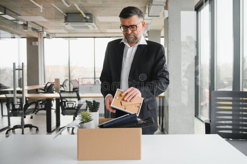 Old Employee Leaving Office with the Box Full of Belongings Stock Photo ...