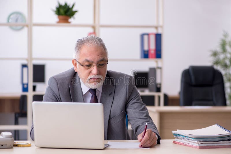 Old Male Employee and Too Much Work in the Office Stock Image - Image ...
