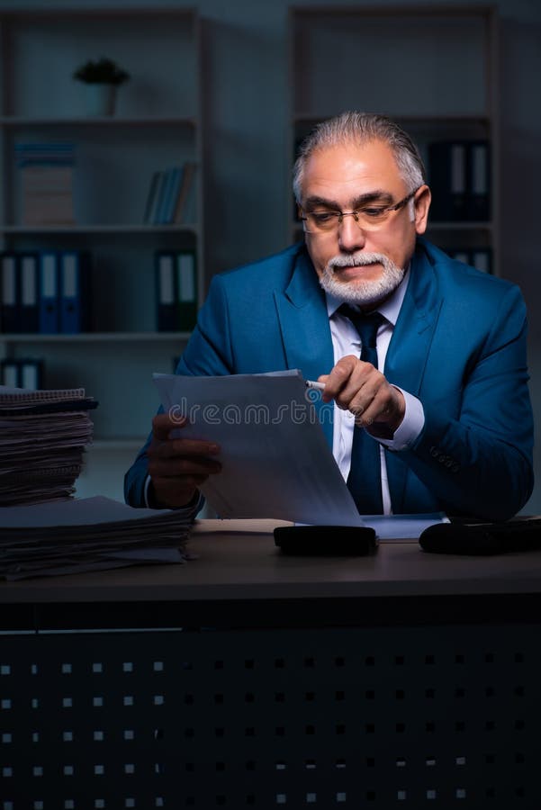 Old Male Employee Working Late in the Office Stock Photo - Image of ...