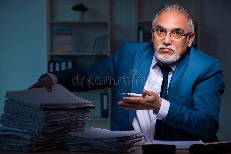Old Male Employee Working Late in the Office Stock Image - Image of ...