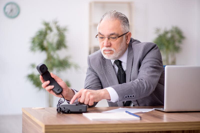 Old Male Employee Working in the Office Stock Photo - Image of pile ...