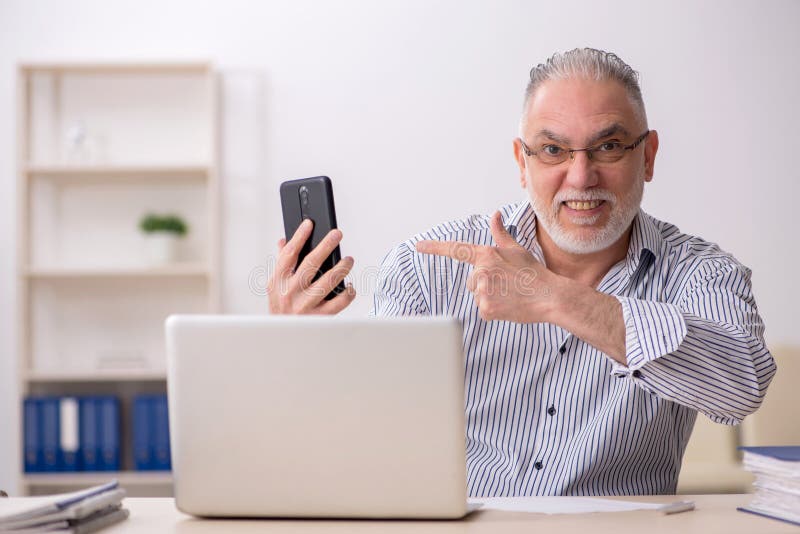 Old Male Employee Working at Workplace Stock Photo - Image of working ...