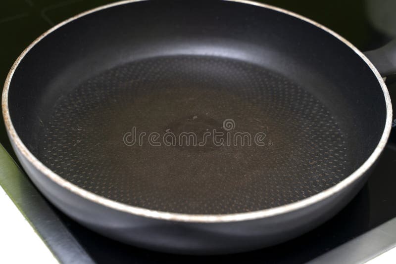 Old Empty Non-stick Frying Pan. the Coating is Damaged Stock Photo ...
