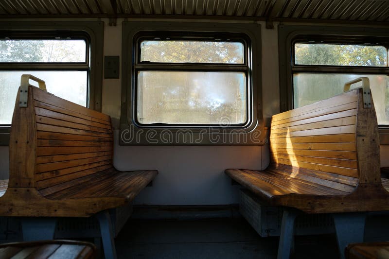 Old Empty Wagon of Train. Wooden Seats in an Empty Coach of Train Stock ...