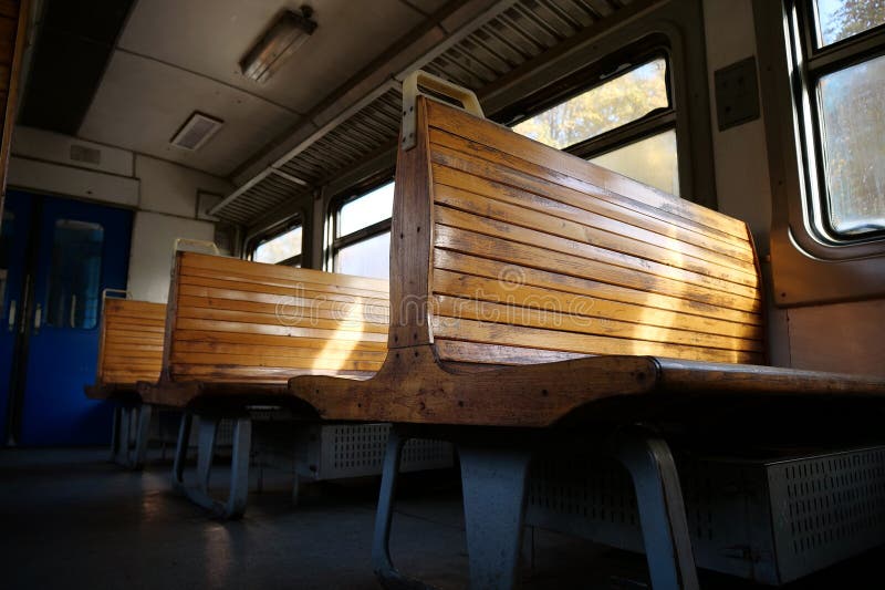 Old Empty Wagon of Train. Wooden Seats in an Empty Coach of Train Stock ...