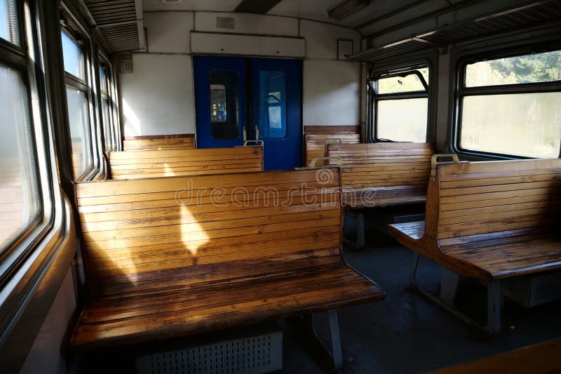 Old Empty Wagon of Train. Wooden Seats in an Empty Coach of Train Stock ...