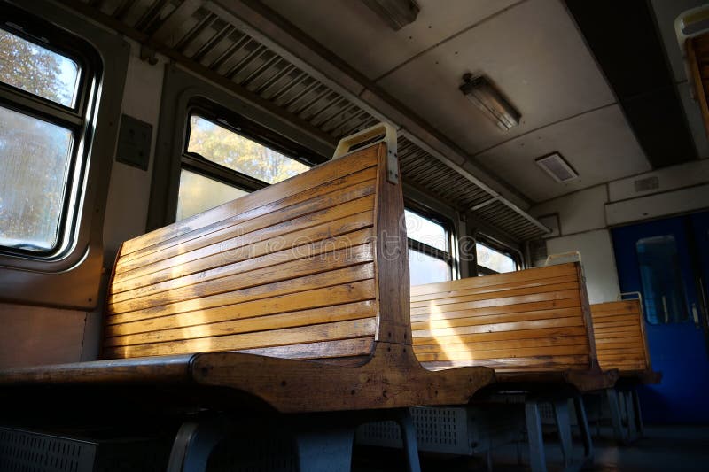 Old Empty Wagon of Train. Wooden Seats in an Empty Coach of Train Stock ...