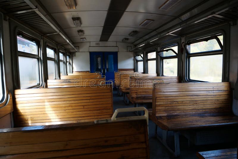 Old Empty Wagon of Train. Wooden Seats in an Empty Coach of Train Stock ...
