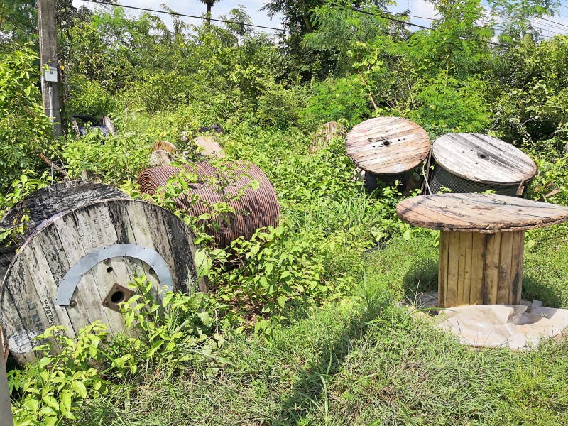 Old Empty Wooden Cables Spools Stock Image - Image of outdoor, grass ...