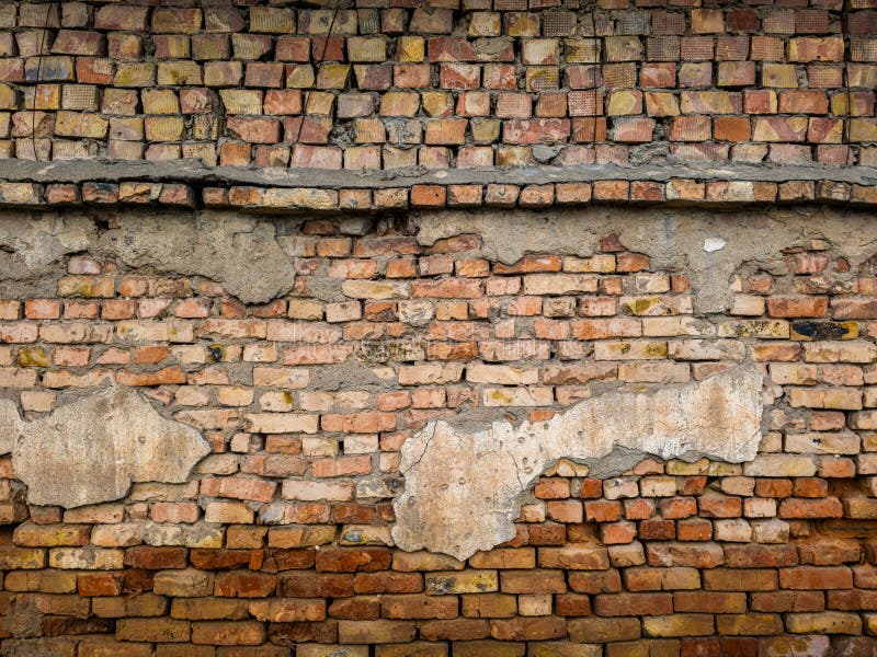 Old Eroded Brick Wall with Damaged Plaster Leftovers Stock Photo ...