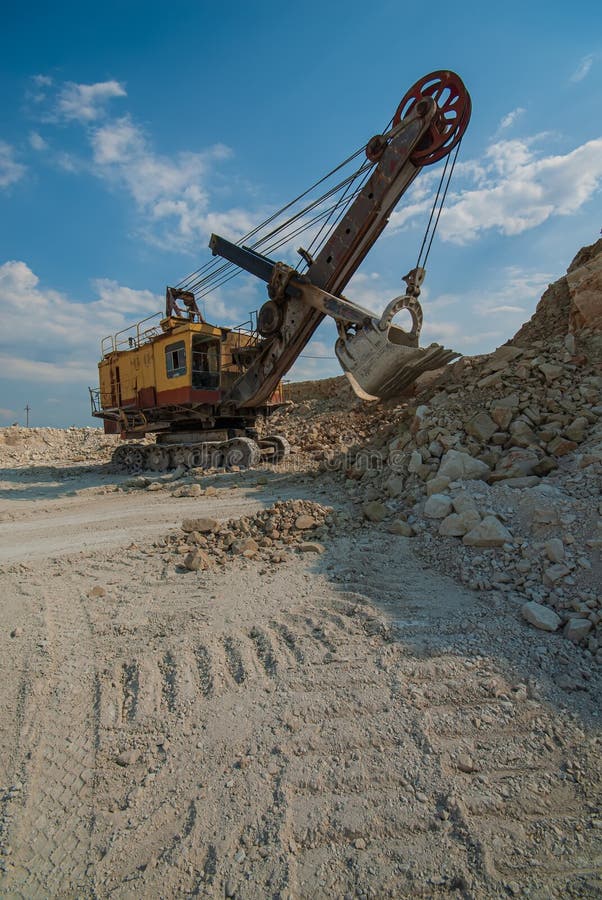 Old Excavator Loading Marl in an Open Pit Stock Photo - Image of earth ...