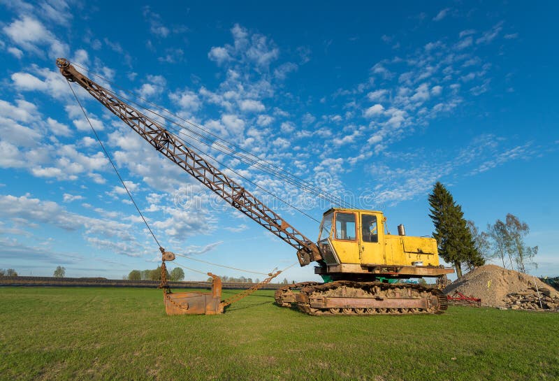 The old excavator stock image. Image of development - 115829513