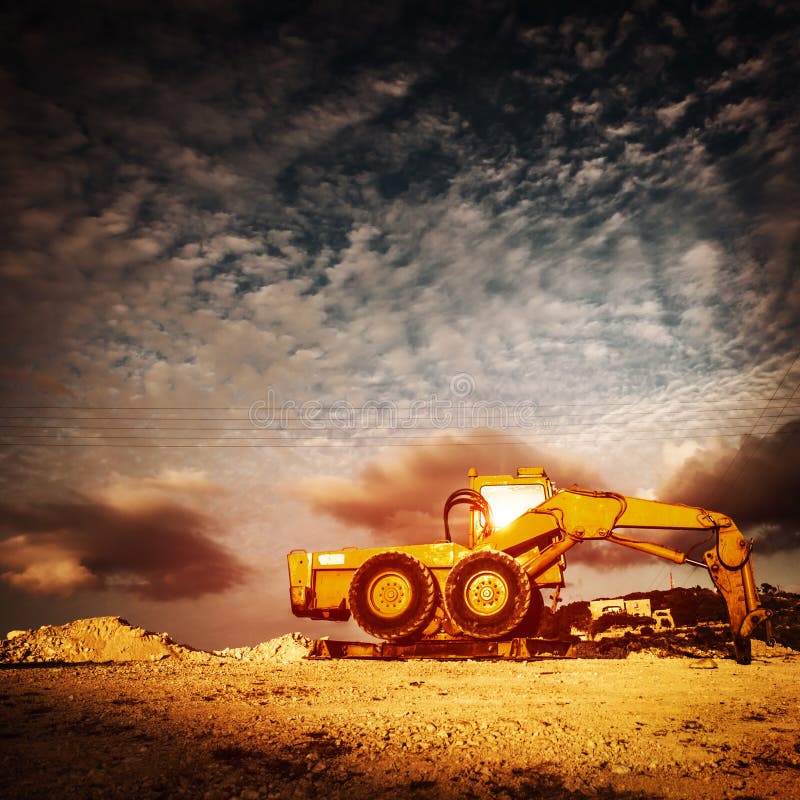 Old excavator on sunset stock image. Image of industrialized - 31904875